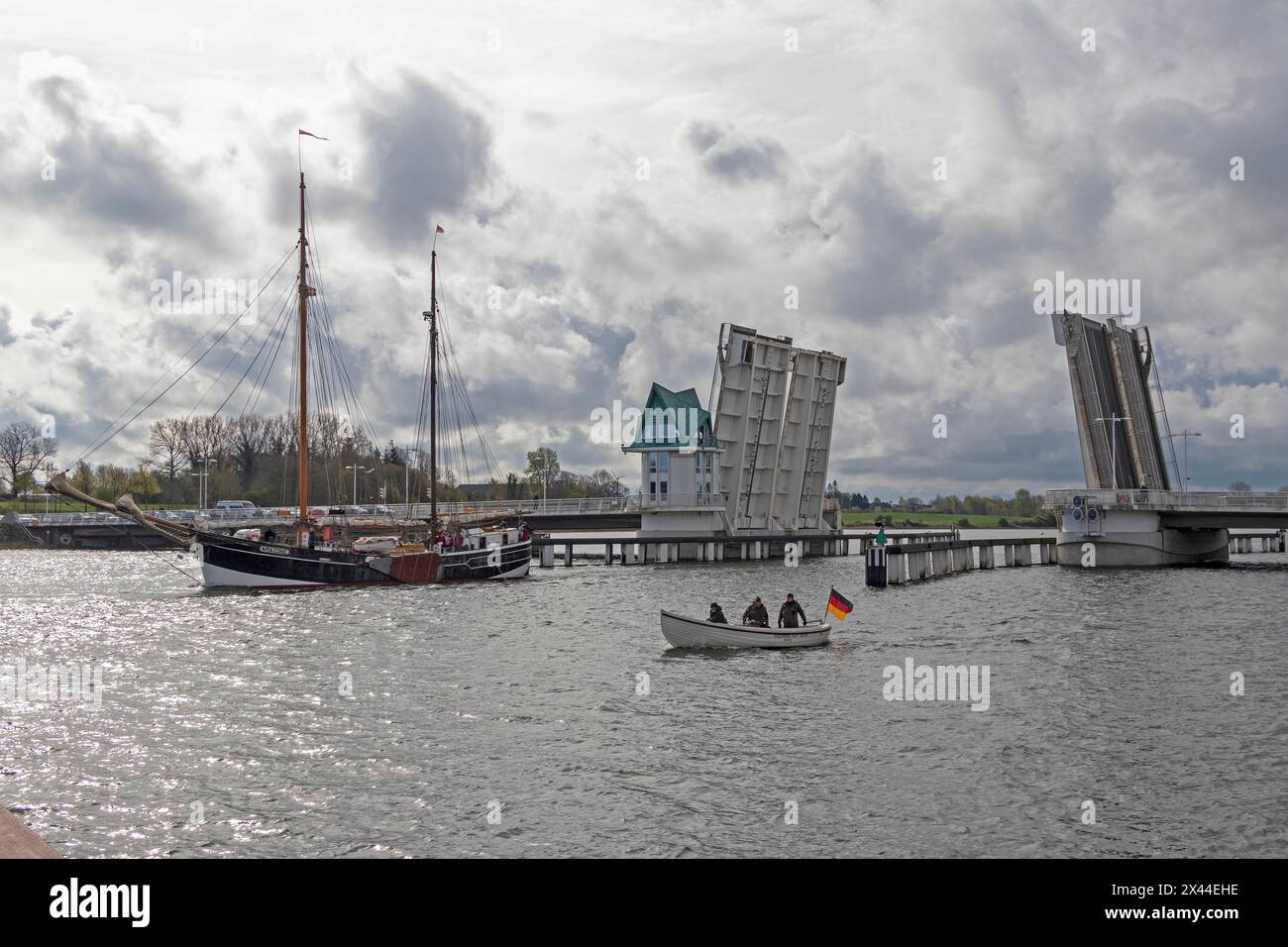 Sailing ship passes through open bascule bridge, Kappeln, Schlei ...
