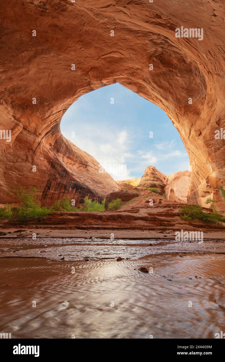 Steam flowing through giant alcove adjacent to Jacob Hamblin Arch in ...