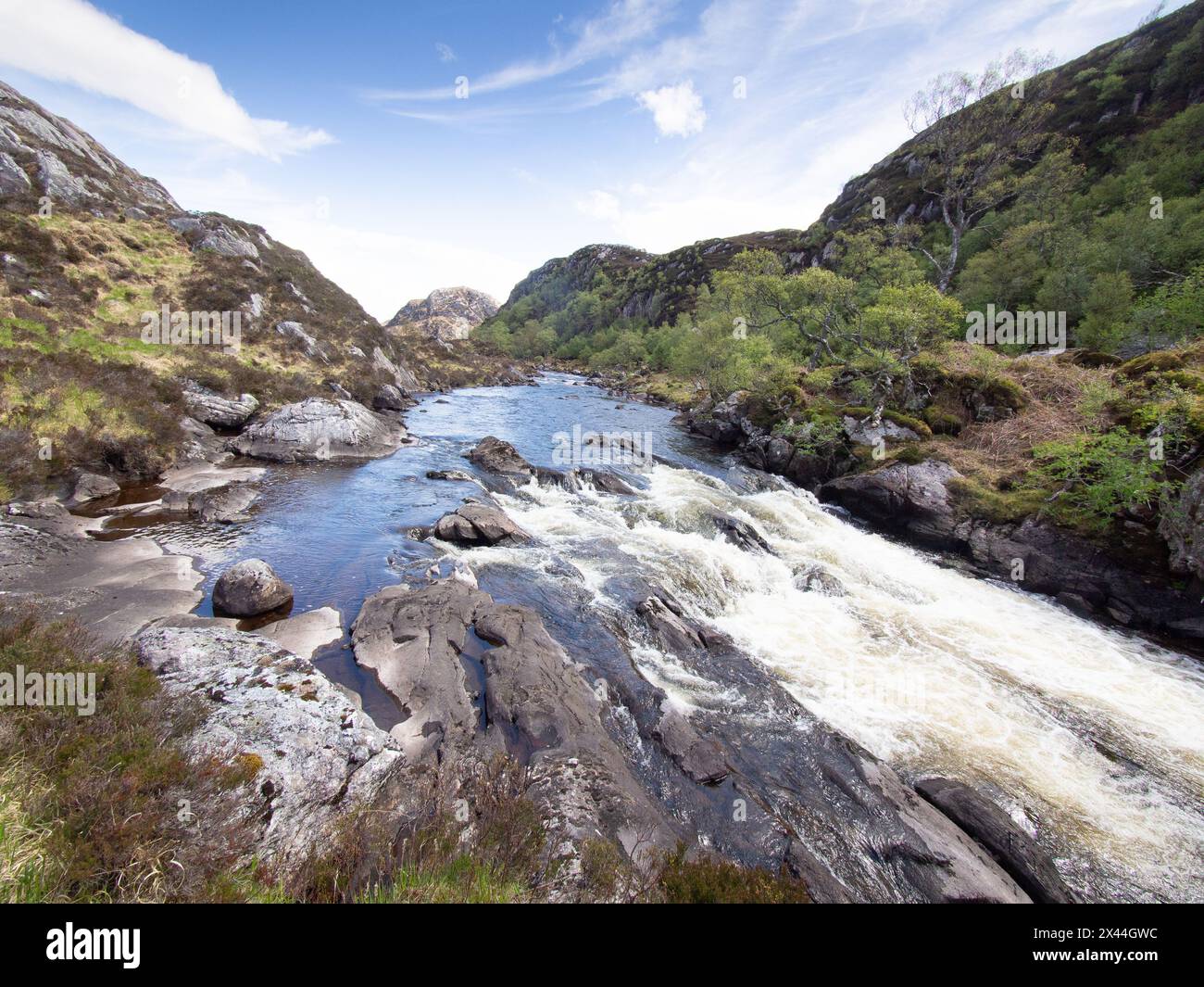 A landscape of hills and river, Sutherland, Scotland, United Kingdom ...
