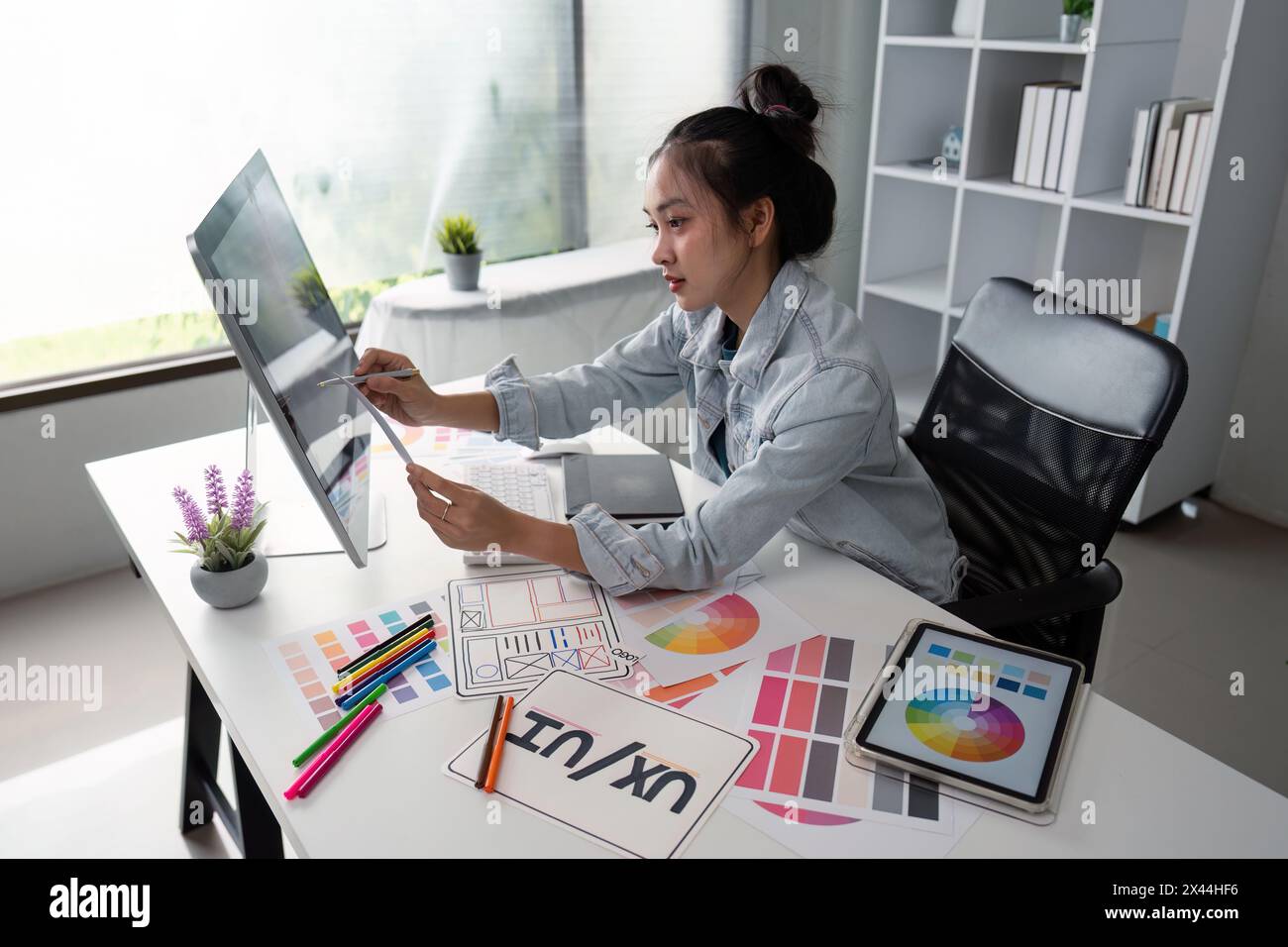 UX designer. Work on creative applications. Man with a palette in his ...