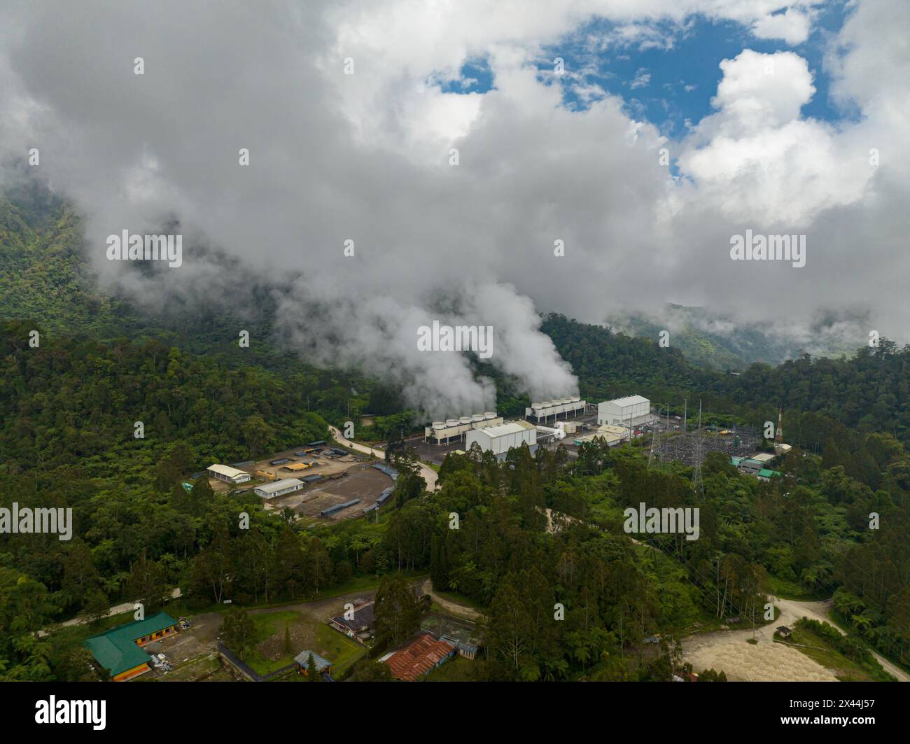 Aerial view of Geothermal station with steam and pipes. Geothermal ...