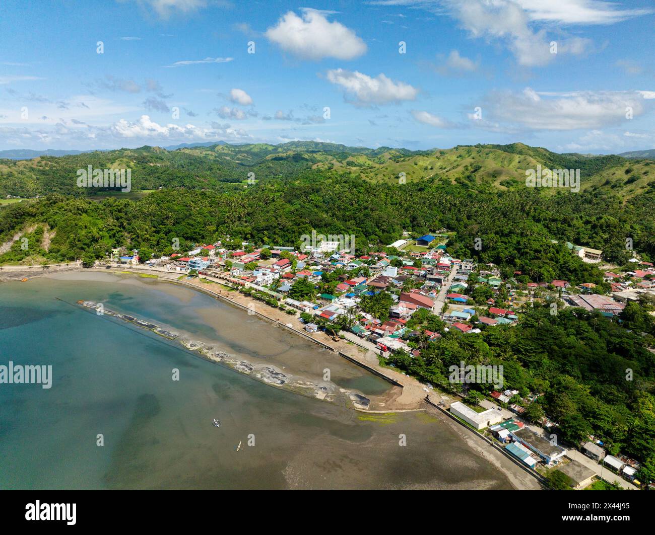Drone view of houses and buildings in Santa Fe, Tablas, Romblon ...