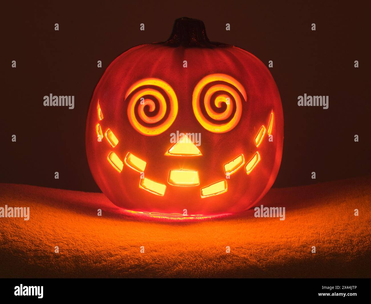 USA, Washington State. Smiling Jack O Lantern face on Pumpkin at ...