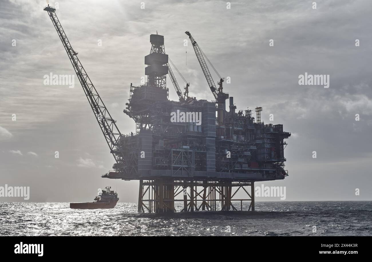 Beautiful sunny summer day in the sea, with jack up drilling rig and ...