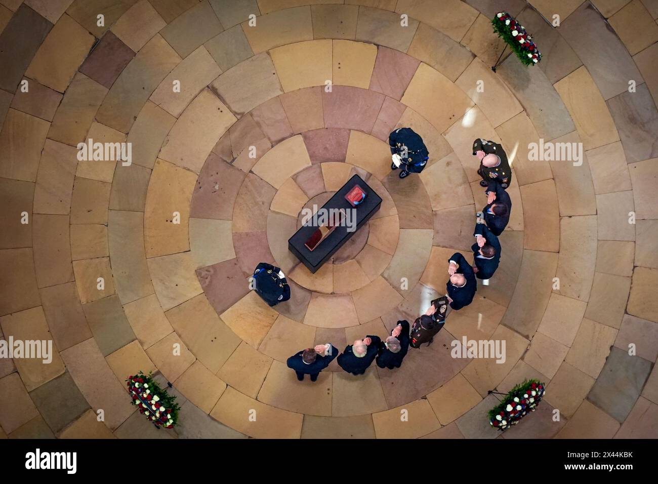 WASHINGTON, DC - APRIL 29: Military leaders salutes an urn containing ...