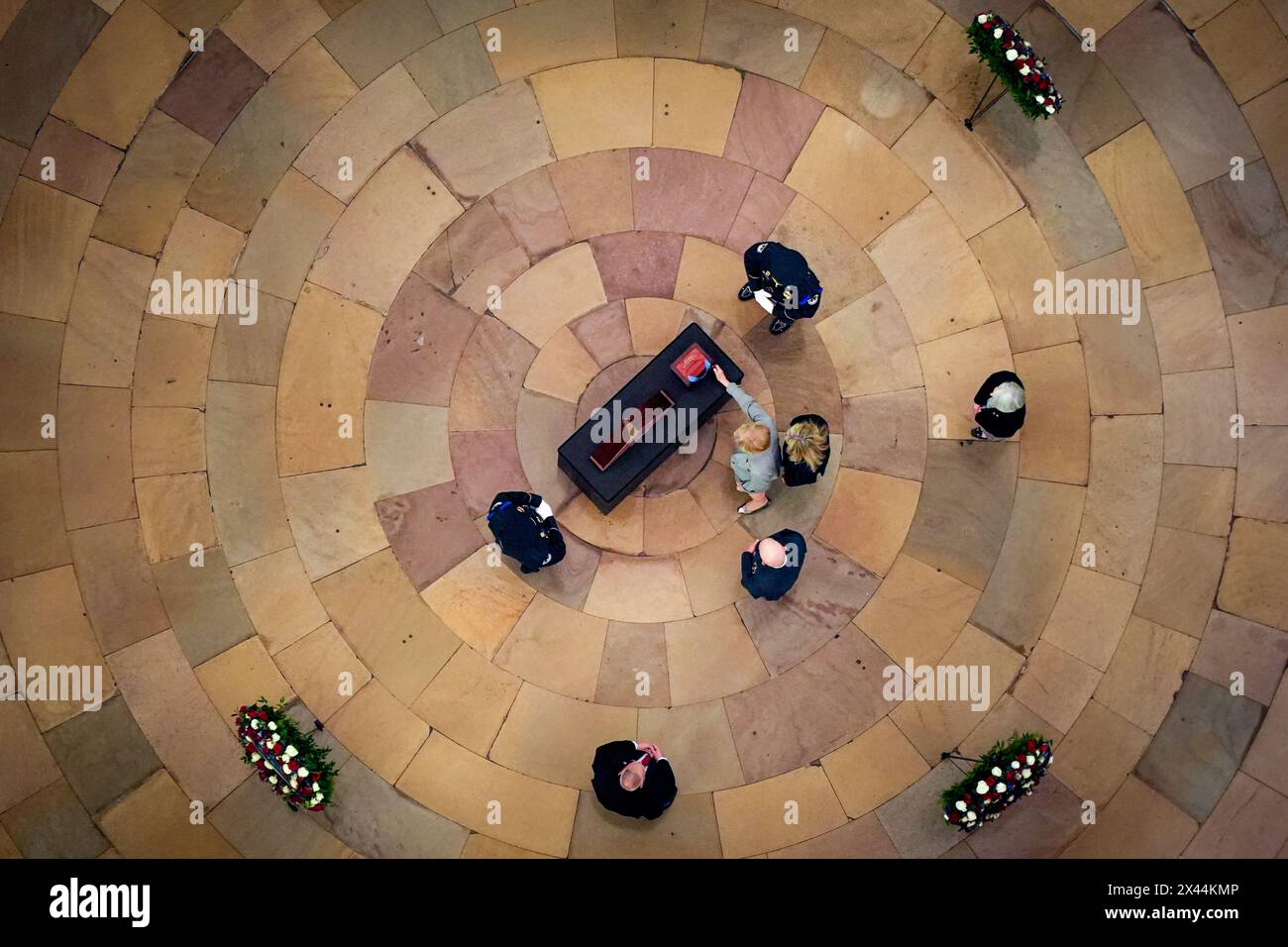 WASHINGTON, DC - APRIL 29: Jeannie Puckett reaches out to touch the urn ...