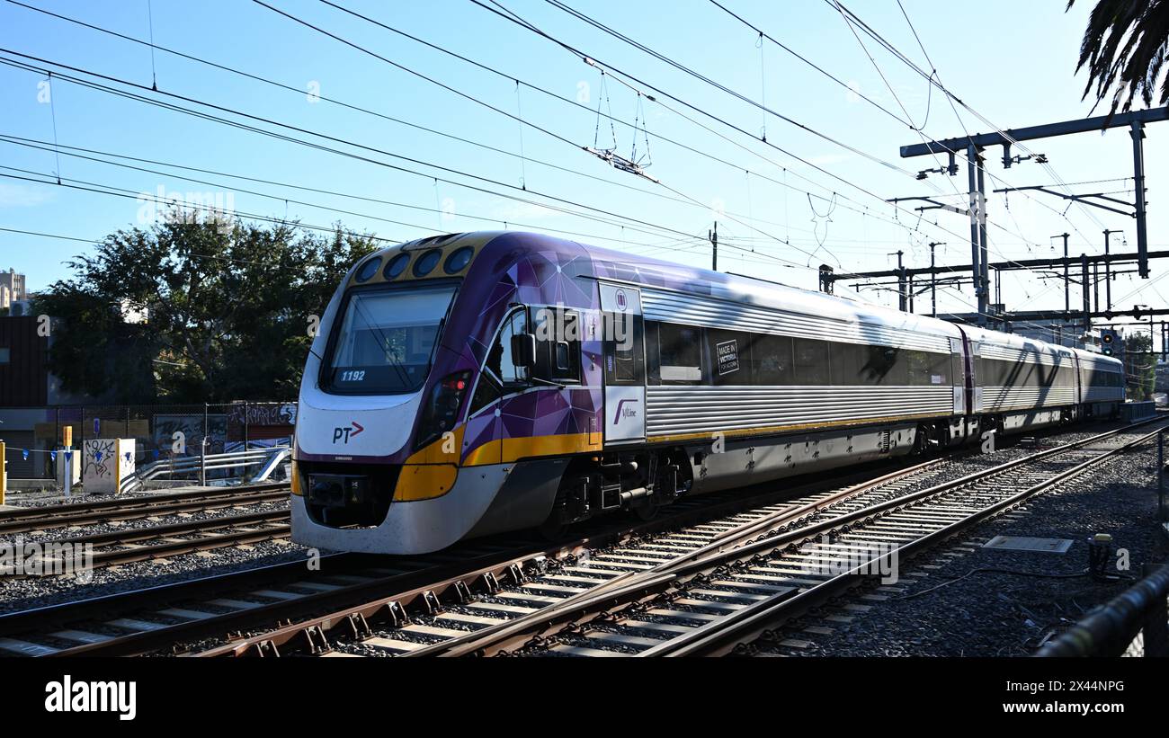 Rear view of a Vline Vlocity diesel train as it travels through the ...