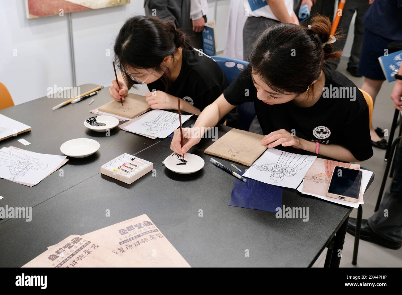 Macao, China. 30th Apr, 2024. Students make replicas of murals during ...
