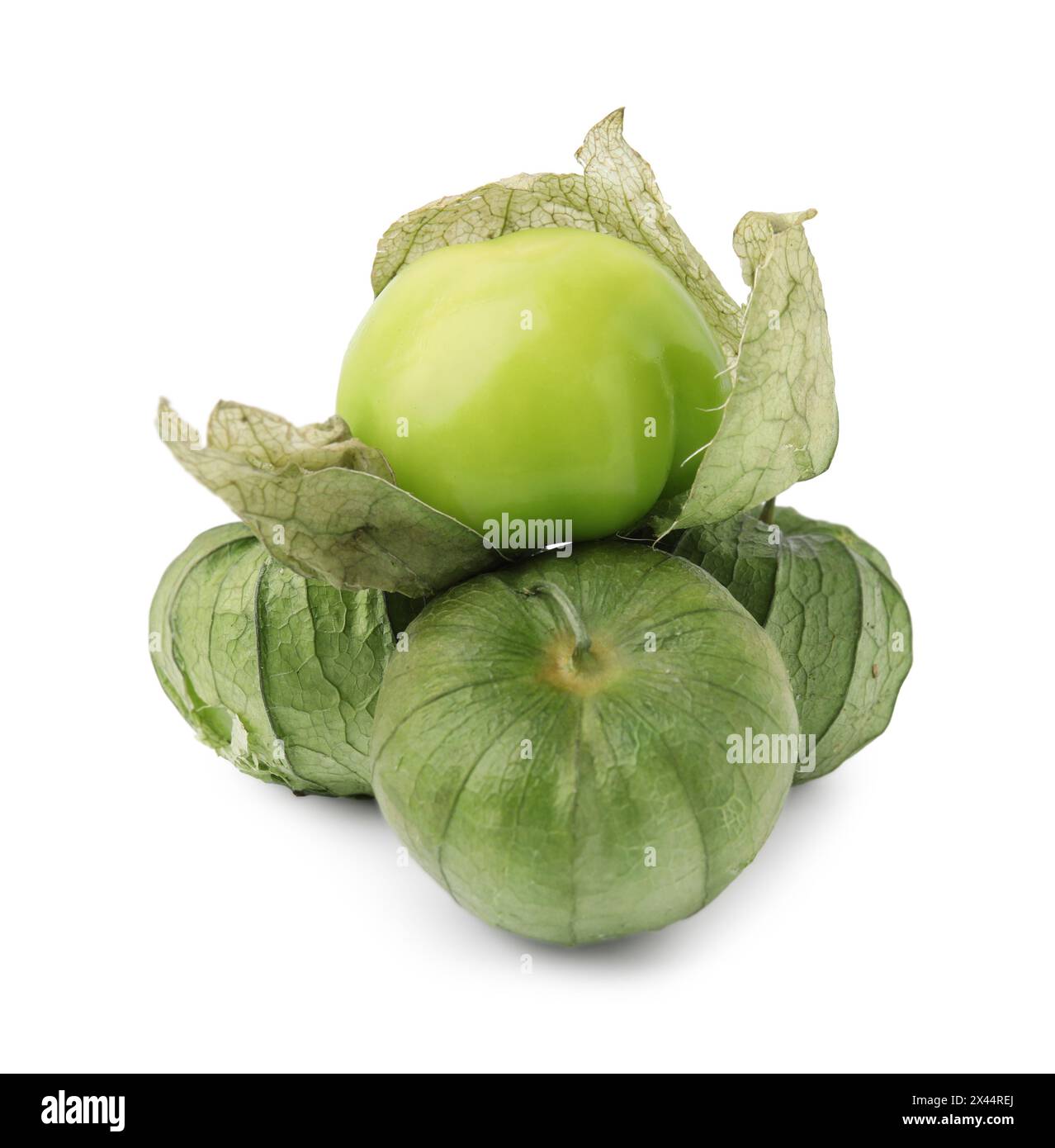 Fresh green tomatillos with husk isolated on white Stock Photo - Alamy