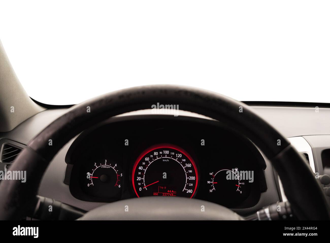 Speedometer on dashboard and steering wheel inside car Stock Photo - Alamy