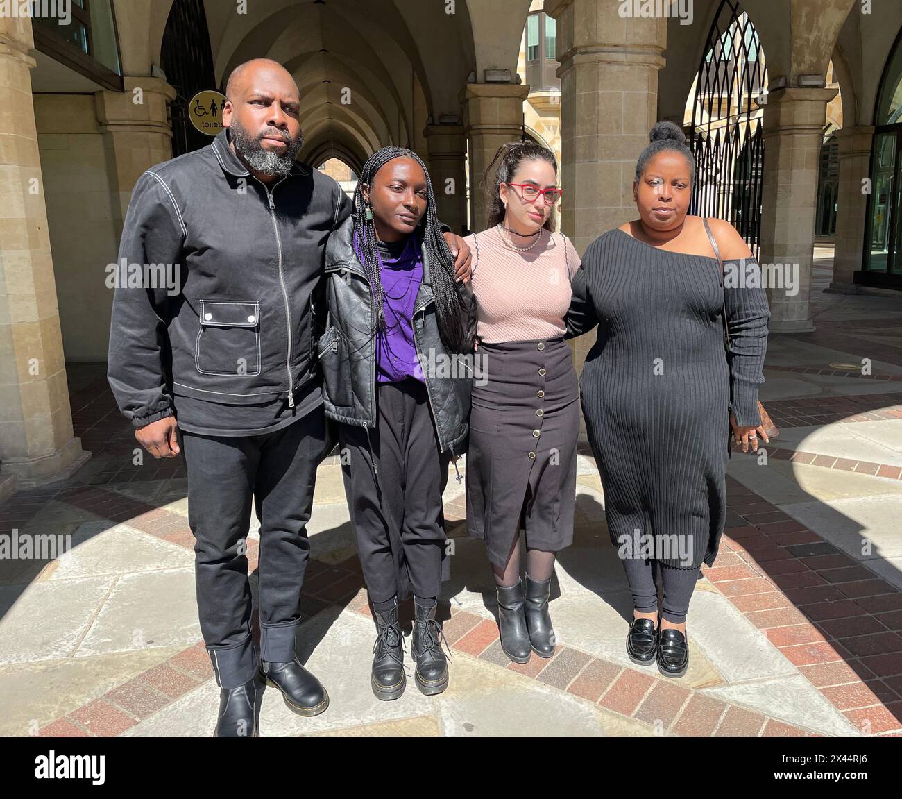(left to right) Gboyega Odubanjo's brother Yomi, his partner Tife ...