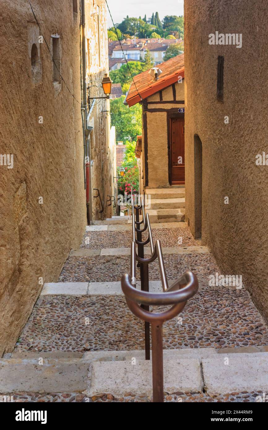 City landscape - view of a medieval side street with stairs in the town ...