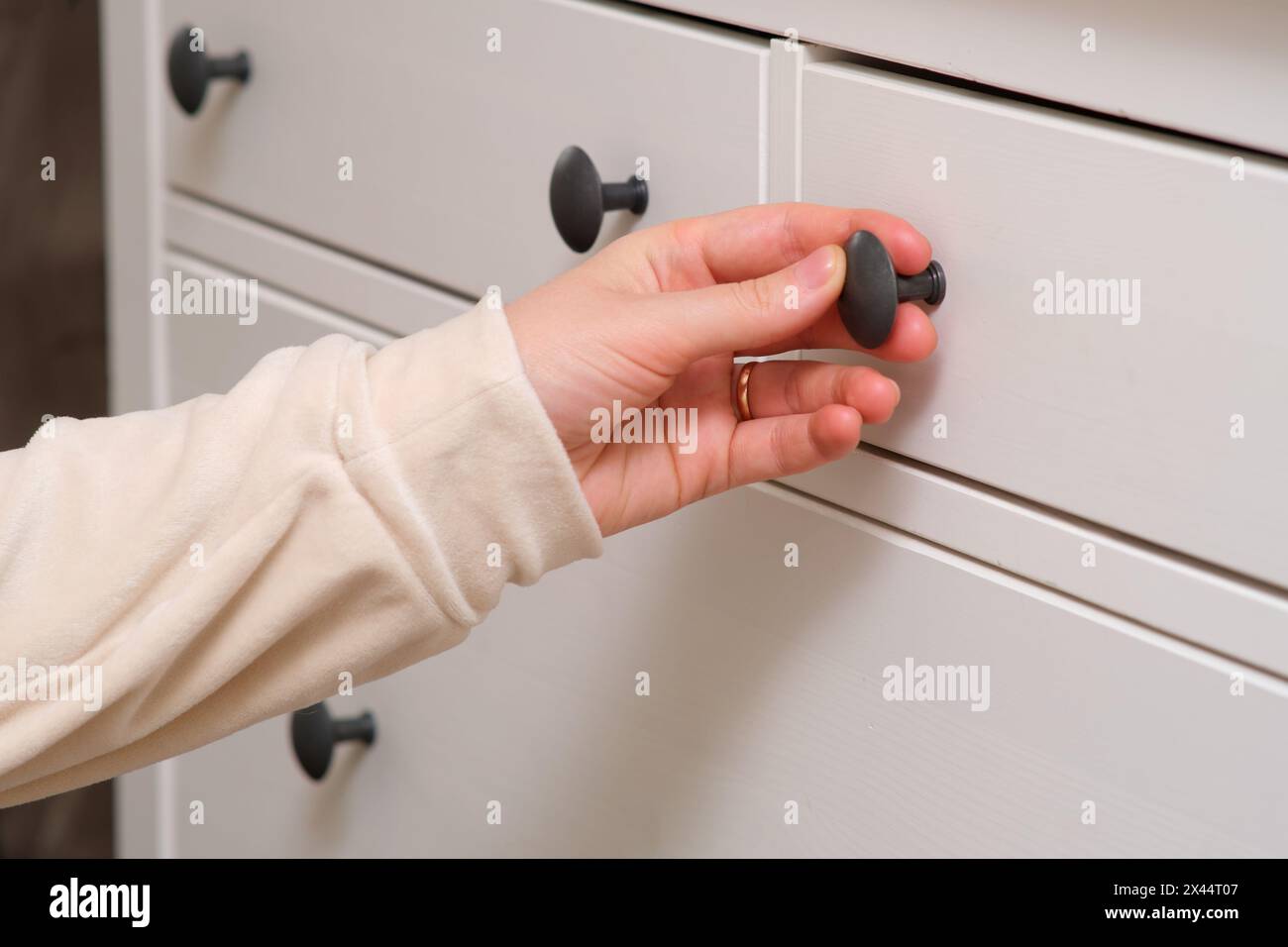 Pull man woman furniture hi-res stock photography and images - Alamy
