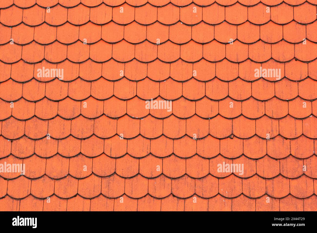 Red tiles on the roof, textured background for design. Old clay roof ...