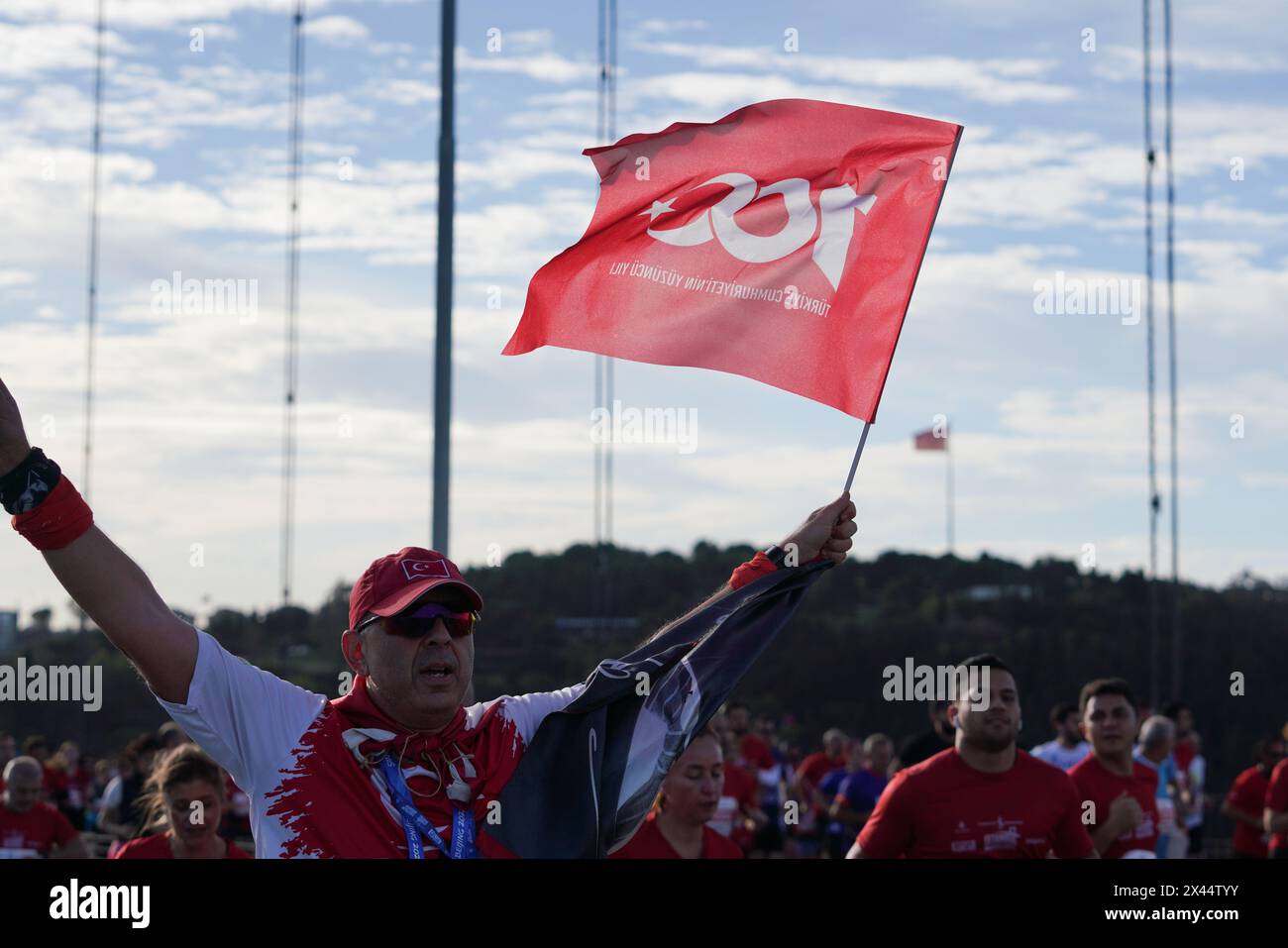 ISTANBUL, TURKIYE - NOVEMBER 05, 2023: Athletes running witg flags in ...