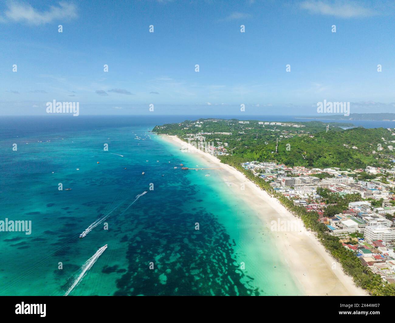 Turquoise sea water with waves and beaches with white sand. Boracay ...