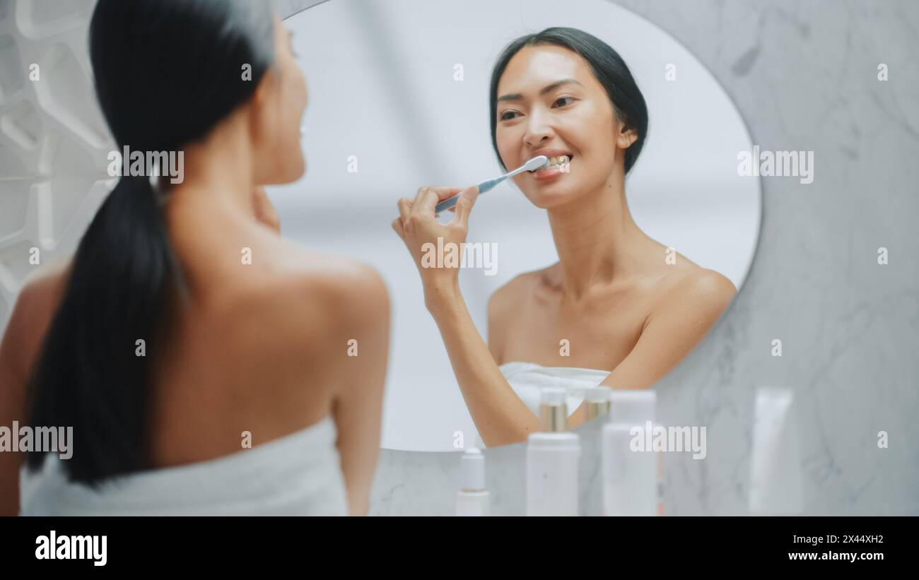 Portrait of Beautiful Asian Woman Uses Tooth Brush to Clean Her Natural ...