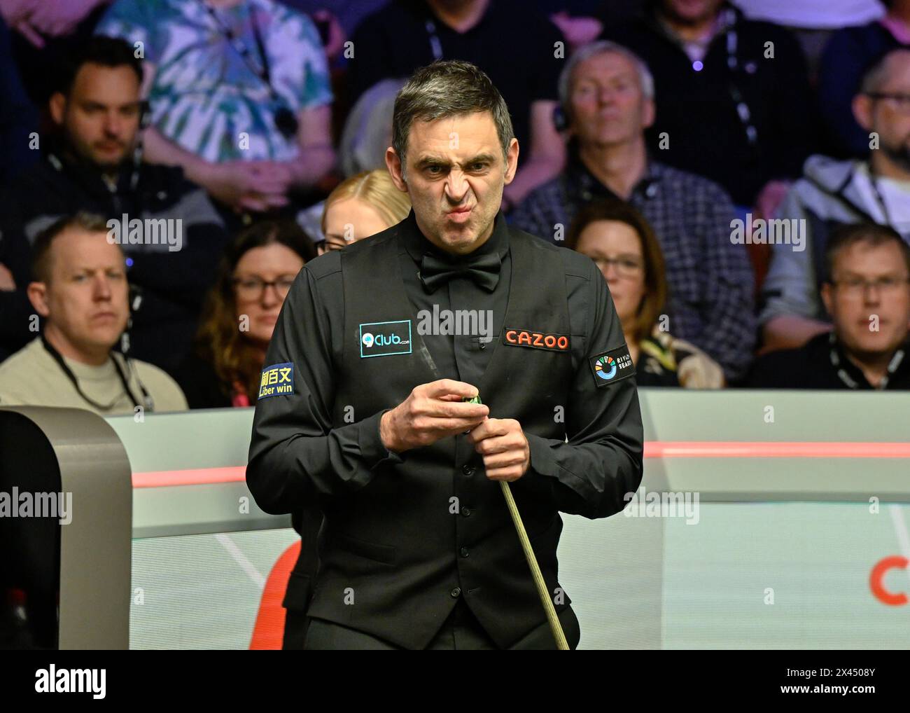 Ronnie O'Sullivan reacts while chalking his cue, during the Cazoo World ...