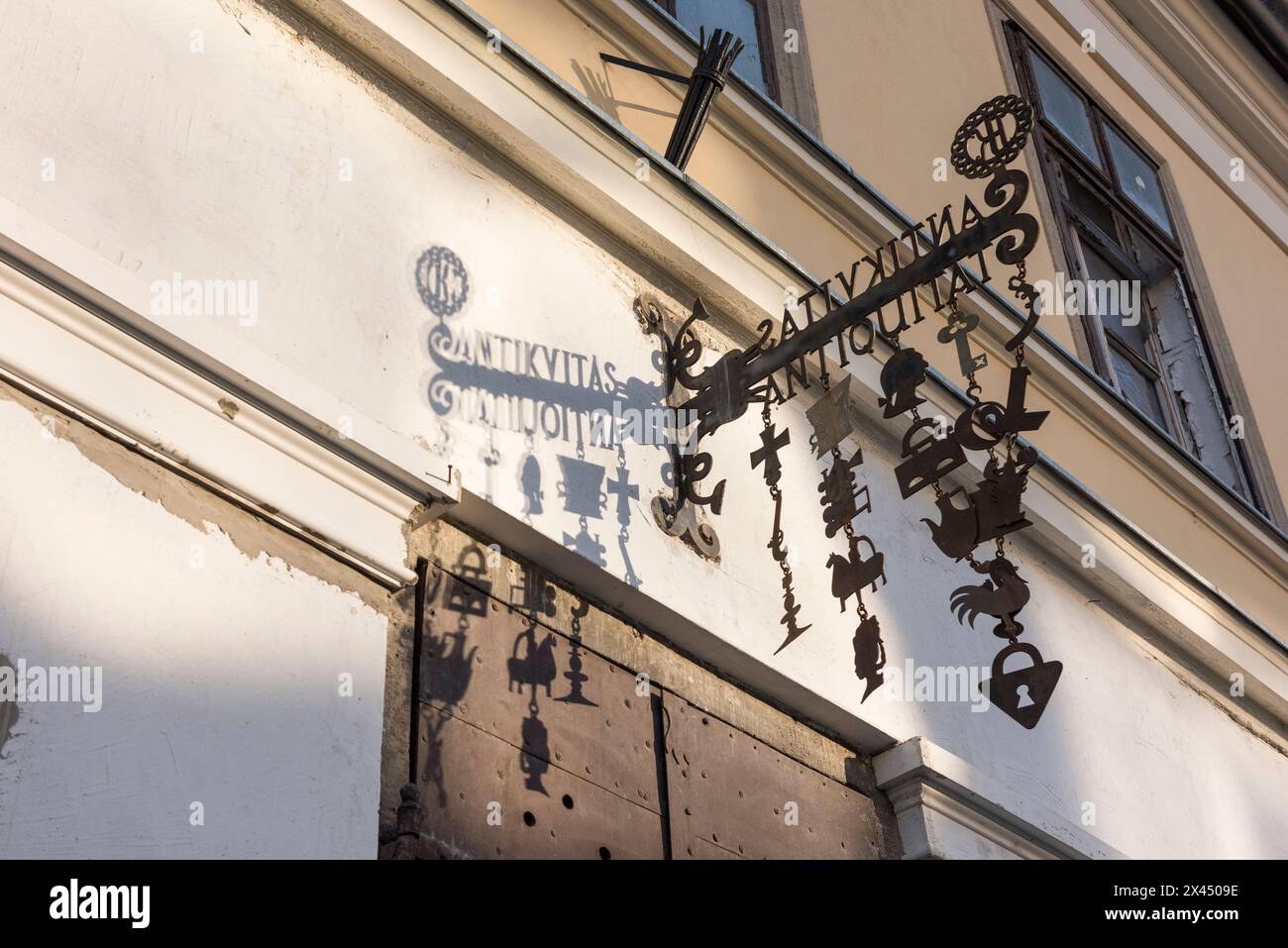 Ornamental shop sign Stock Photo - Alamy