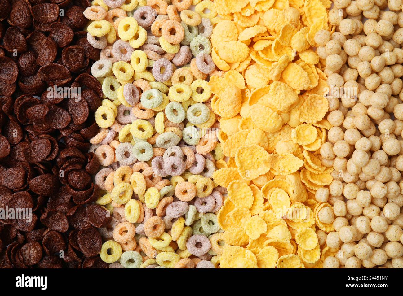 Different types of breakfast cereals as background, top view Stock ...