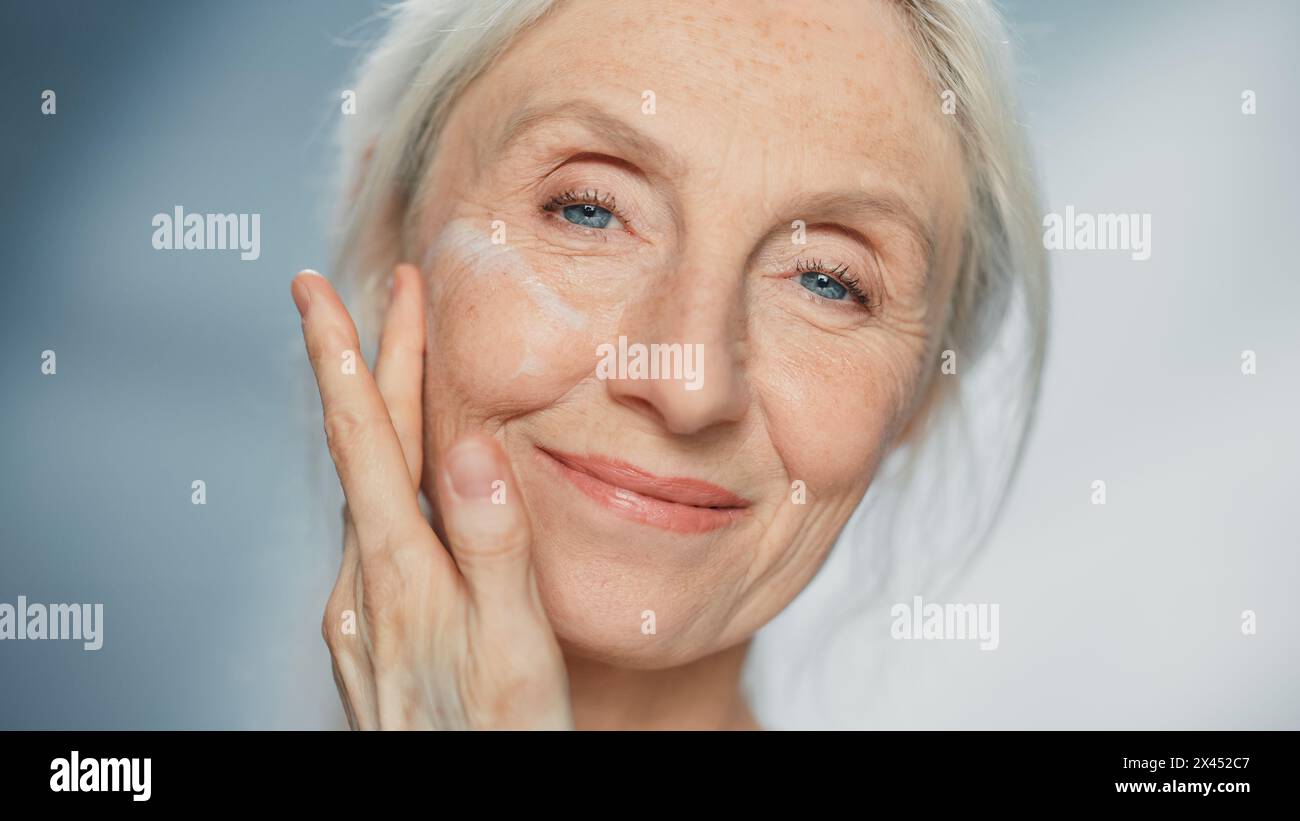 Elderly woman face glow hi-res stock photography and images - Alamy