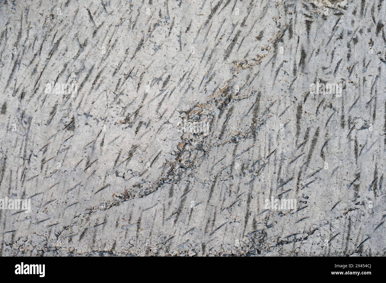 Damaged concrete surface. Structure relief of gray concrete with crack ...