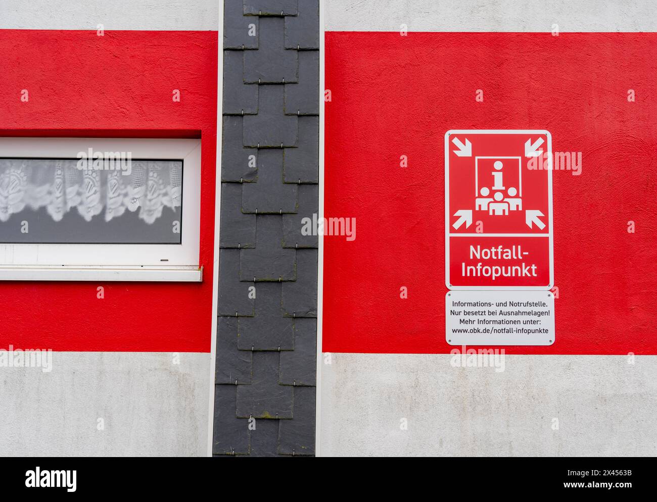 Indication of an emergency information point at a fire station, contact ...