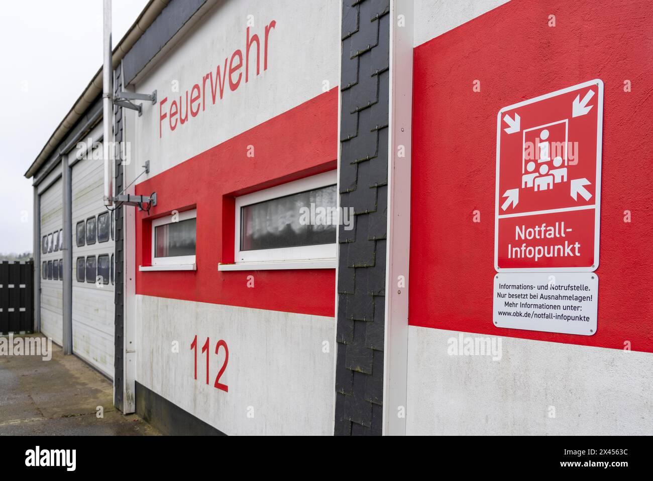 Indication of an emergency information point at a fire station, contact ...