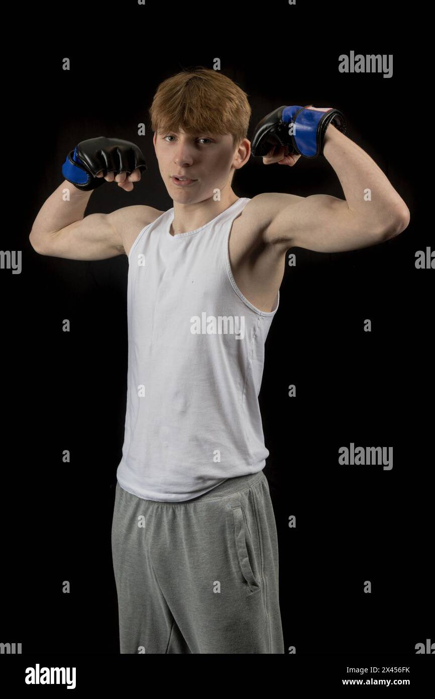 Boxer flexing her muscles hi-res stock photography and images - Alamy
