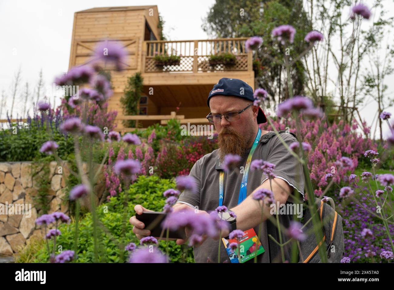 Chengdu. 29th Apr, 2024. Chad Sinclair takes photos of exhibits at the ...