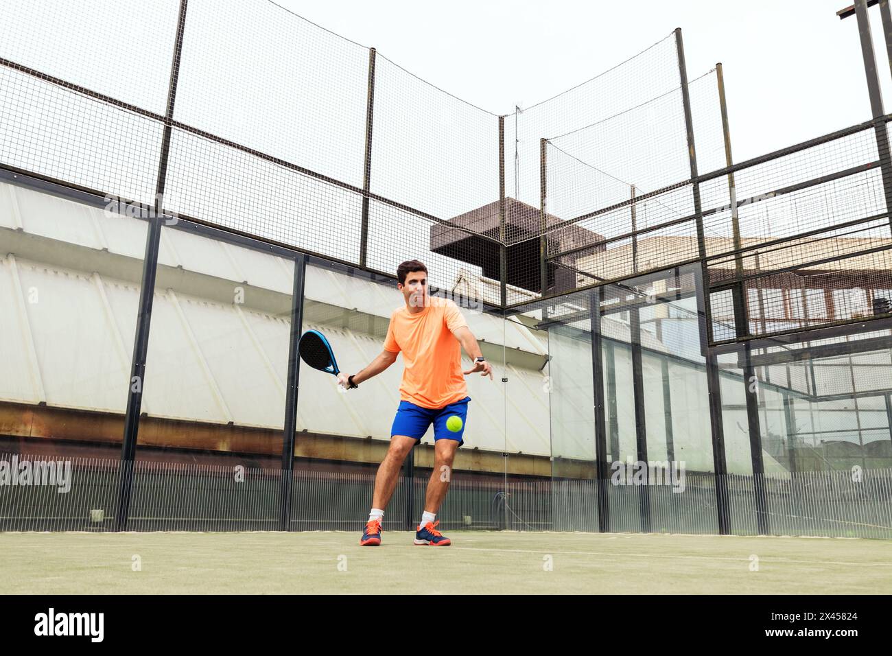 young man playing paddle tennis Stock Photo - Alamy