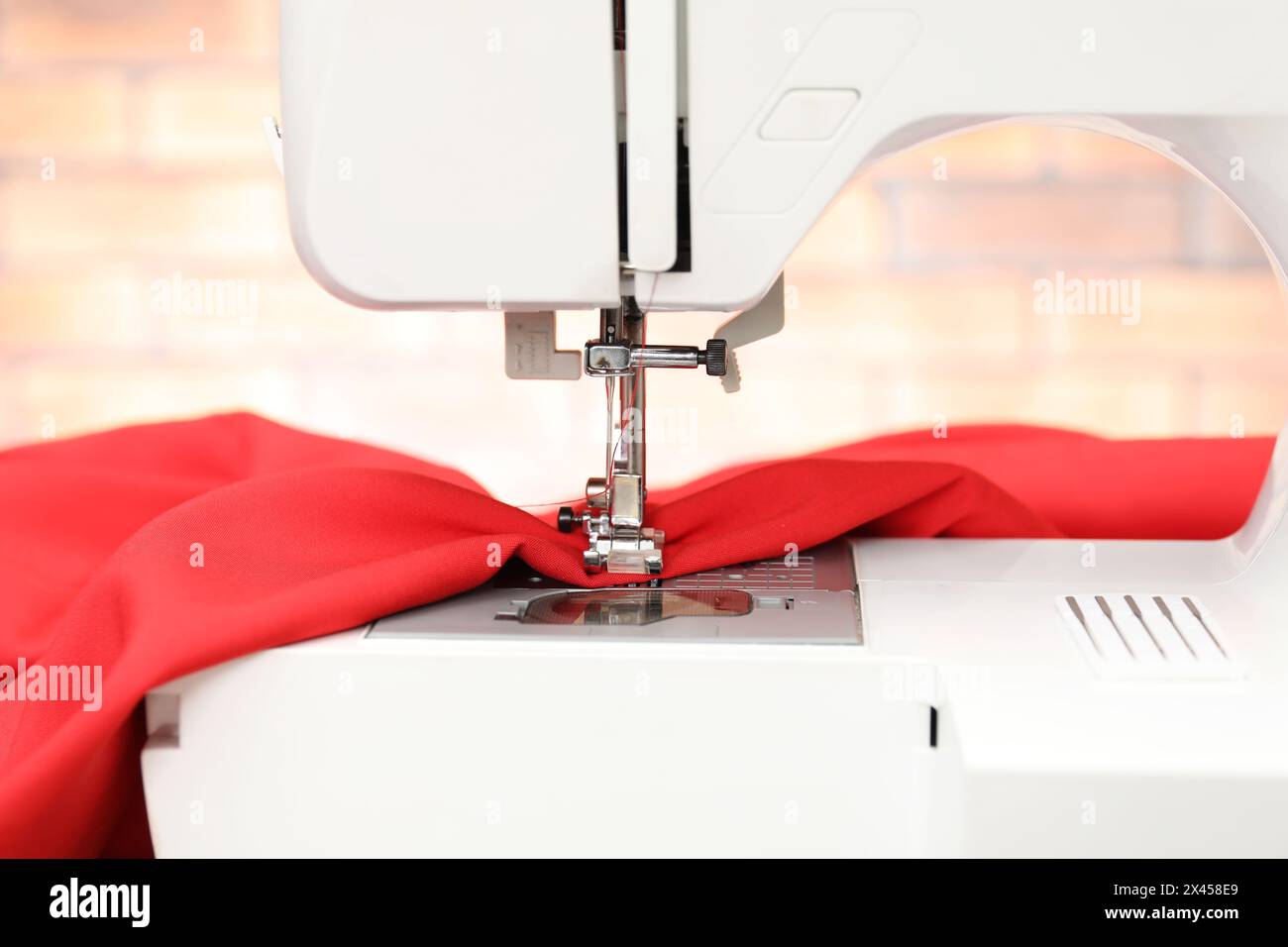 Sewing machine red fabric hi-res stock photography and images - Alamy