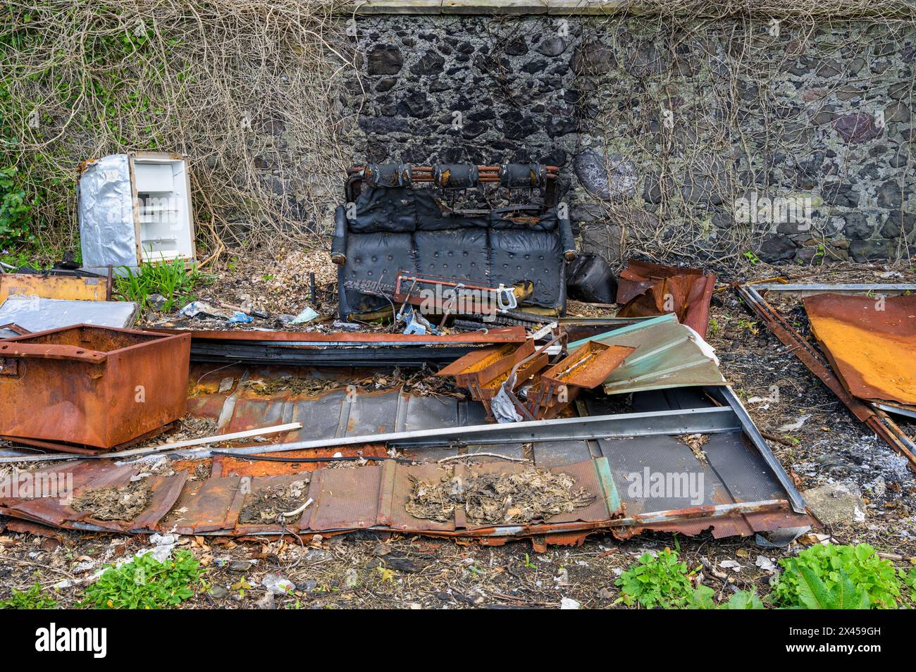 Rubbish dumped sofa hi-res stock photography and images - Alamy