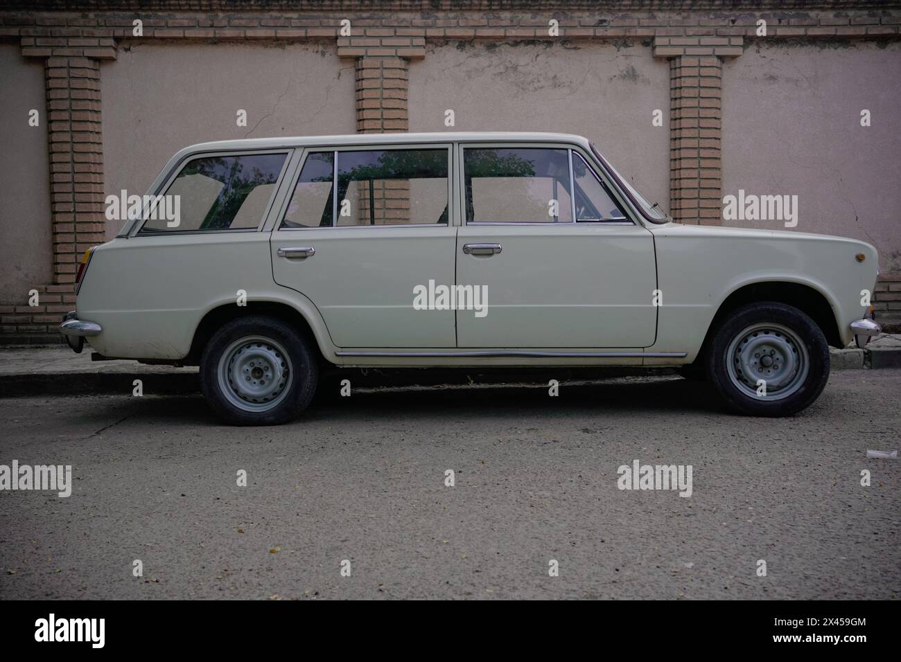 Classic white sedan car on the street Stock Photo - Alamy