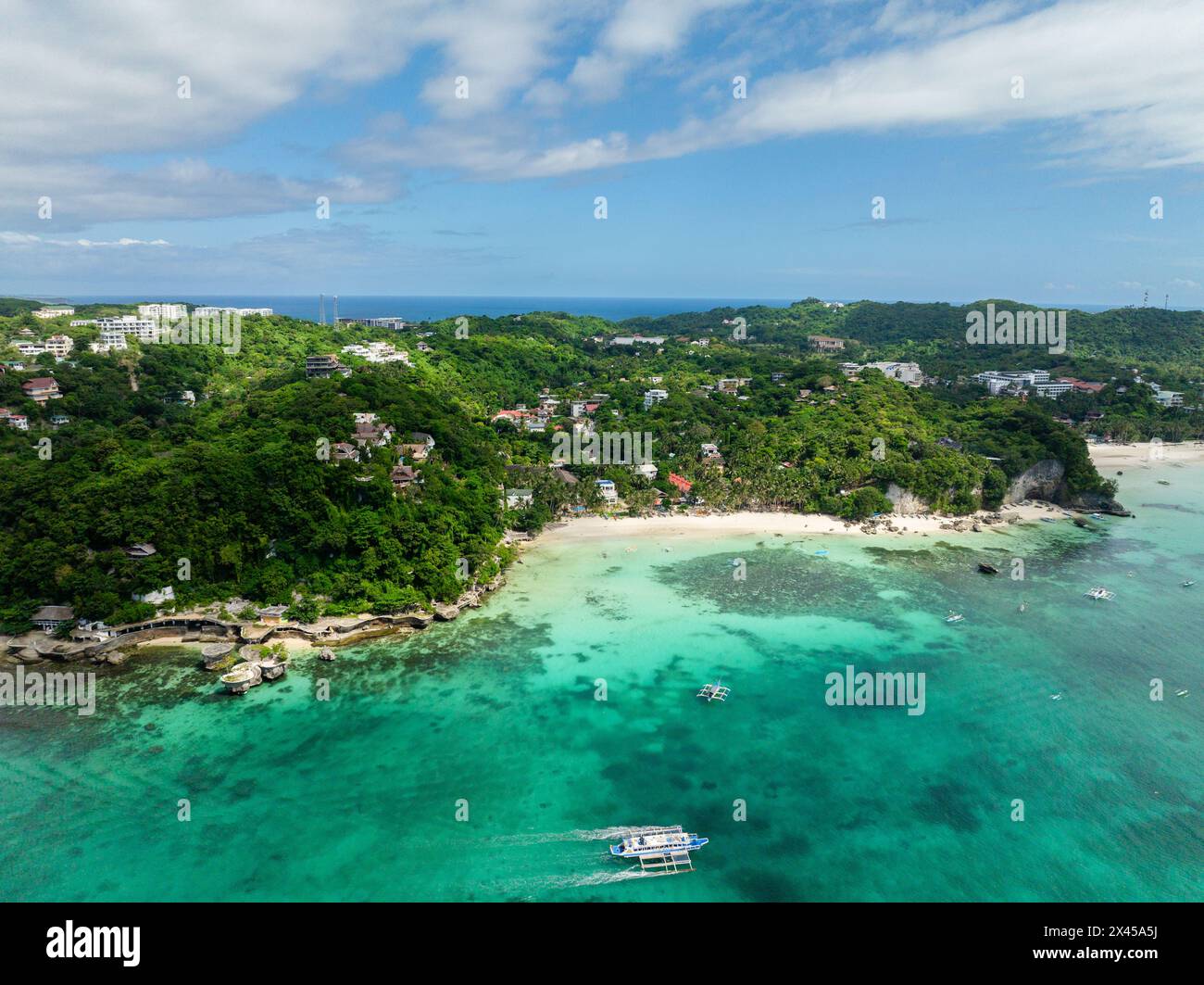 Diniwid beach white sand boats hi-res stock photography and images - Alamy
