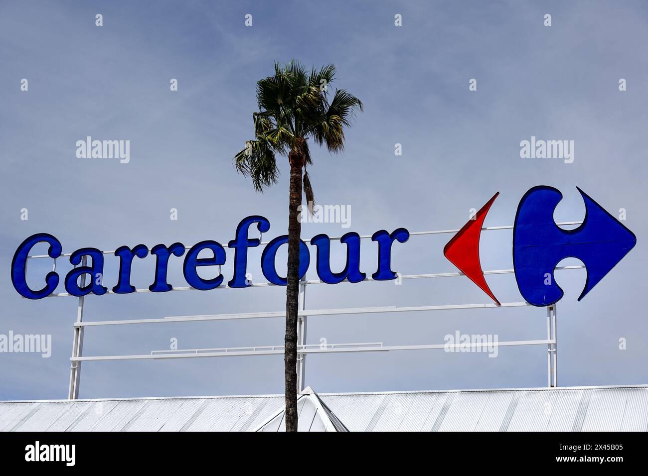 Finestrat, Spain - April 9, 2024: Carrefour logo sign on Carrefour ...