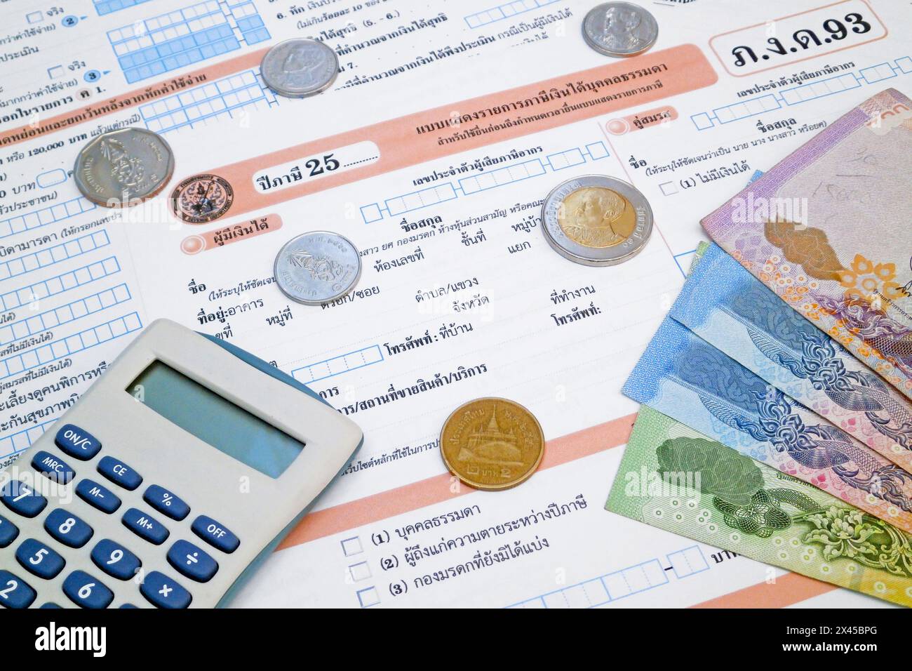 Bangkok, Thailand - October 05 2018: A calculator and some baht coins ...