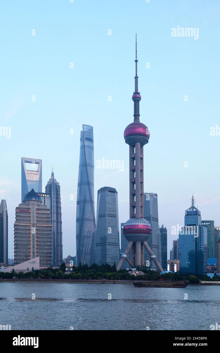 Shanghai, China - August 10 2018: Financial district of Pudong at dusk ...