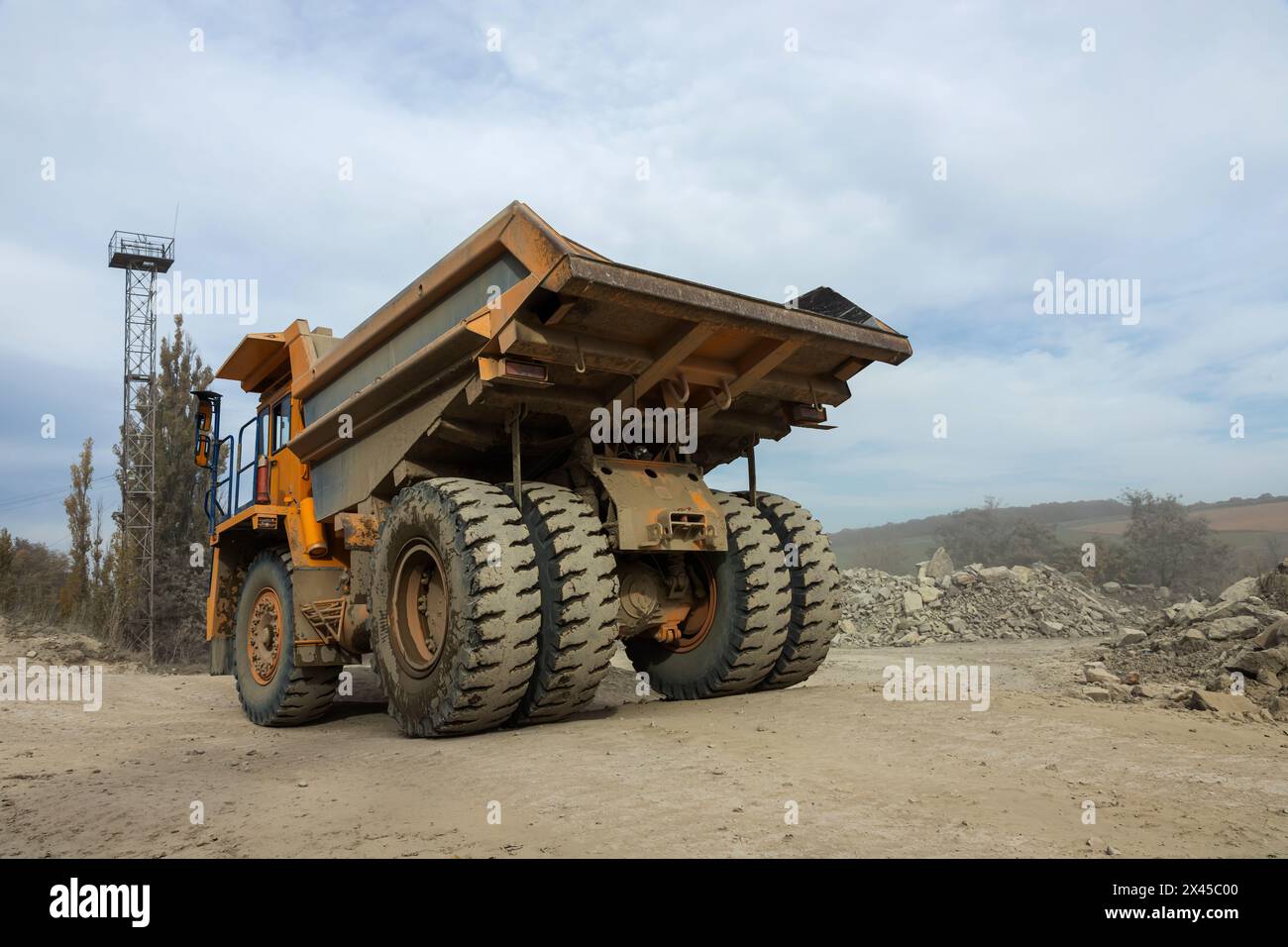 Large mining dump truck. Transport industry. Extraction of stone in an ...