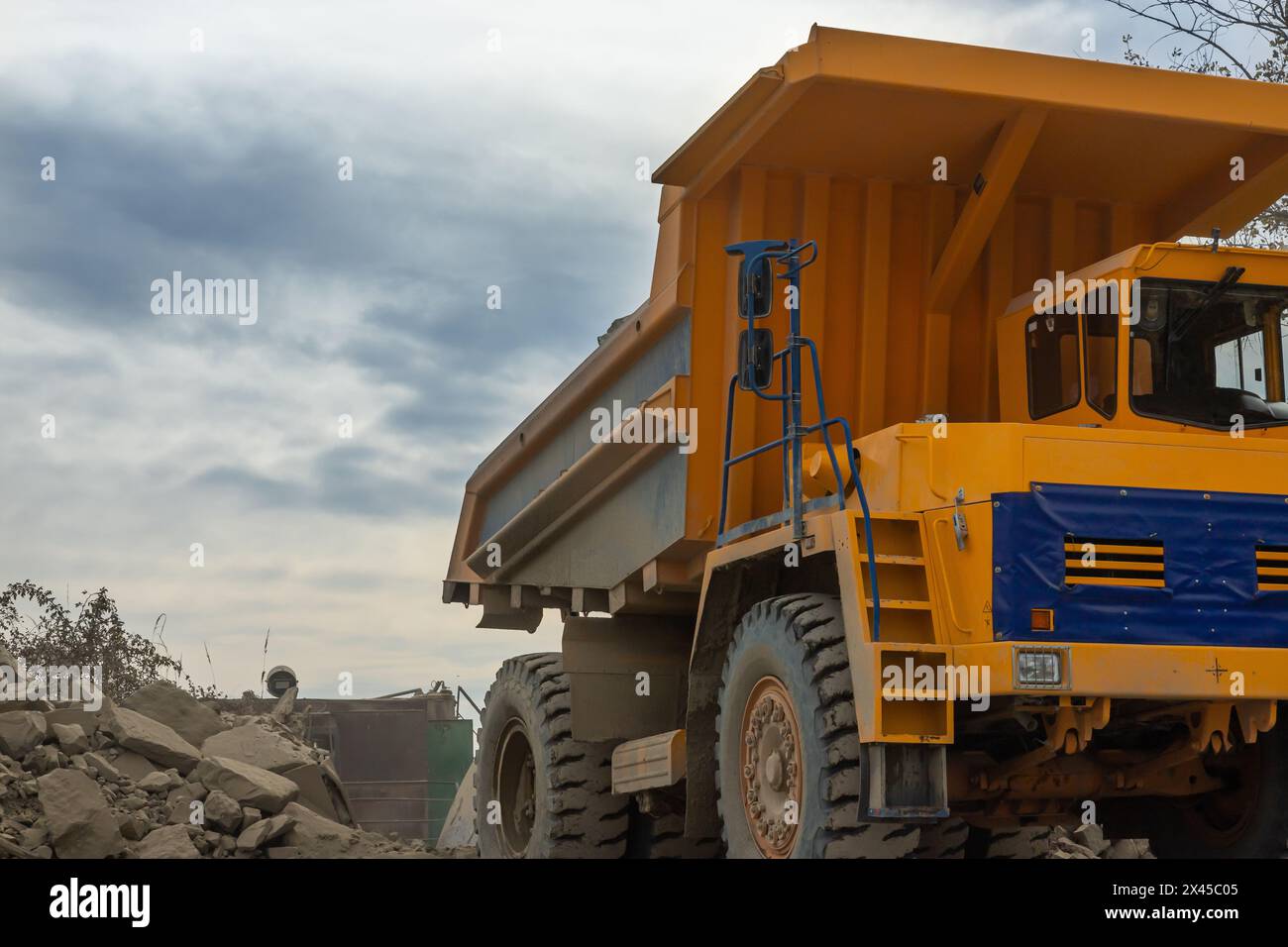 Large mining dump truck. Transport industry. Extraction of stone in an ...