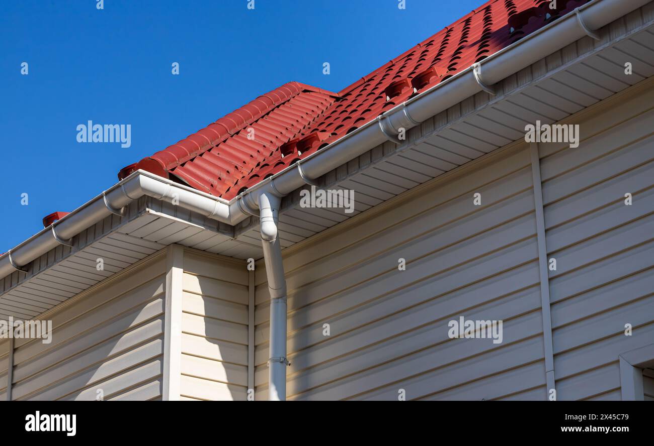 Building Modern House Construction with metal roof corner, rain gutter ...
