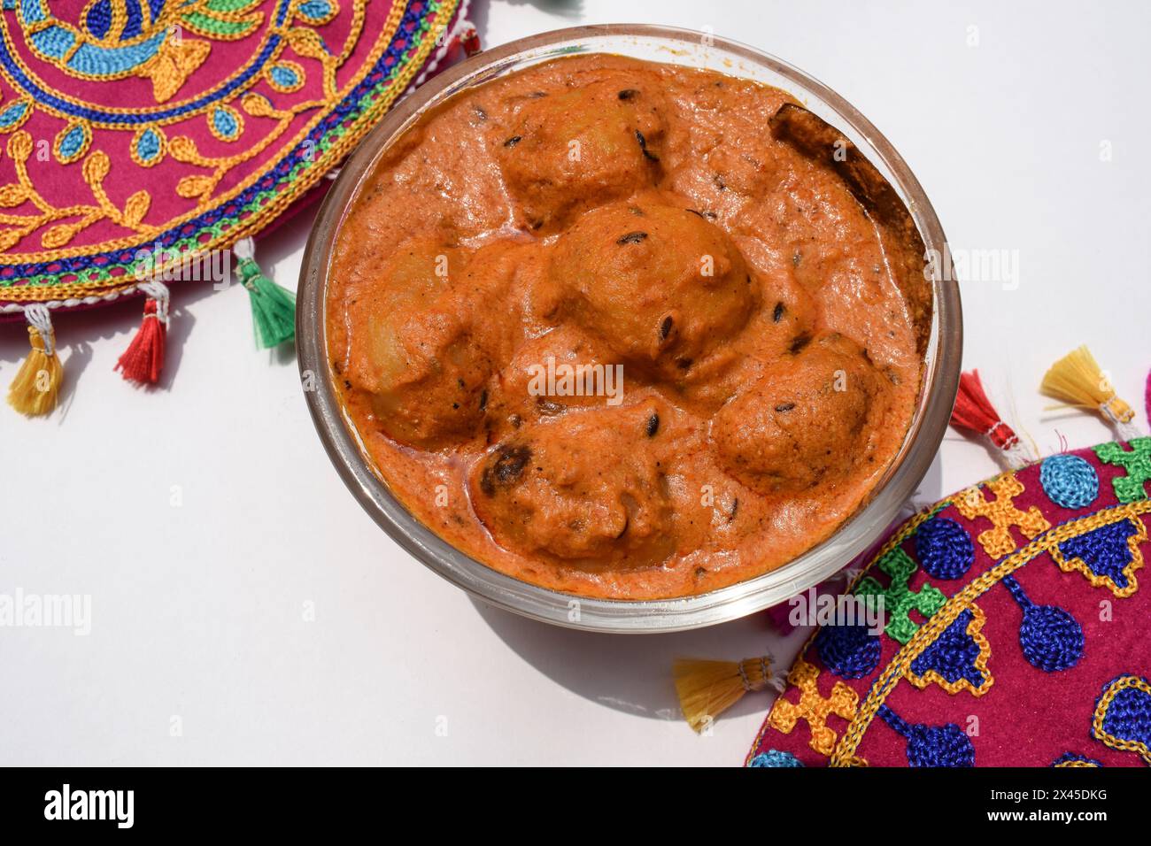 Indian food - Kashmiri Dum Aloo or potatoes in red gravy served in bowl ...