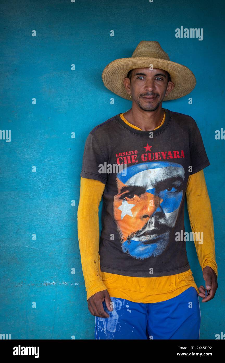 A young man wearing a sombrero and a Che Guevara tee shirt stood ...