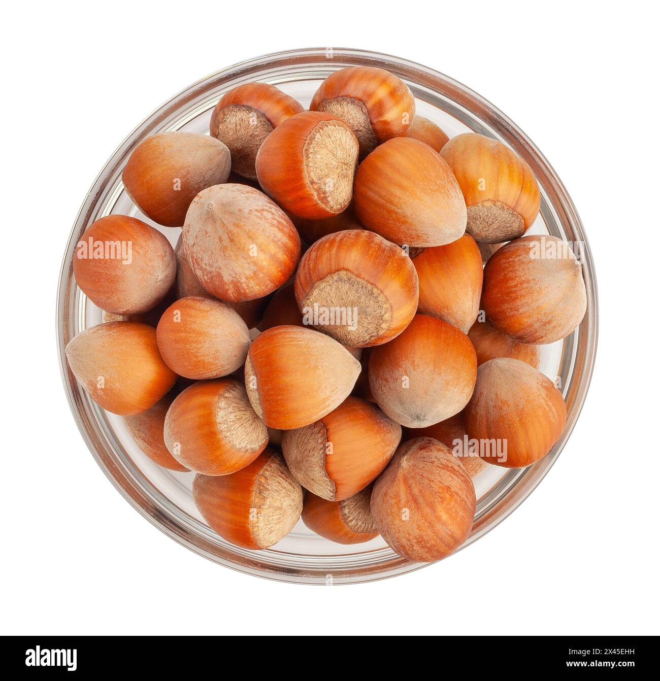 hazelnuts bowl path isolated on white top view Stock Photo - Alamy