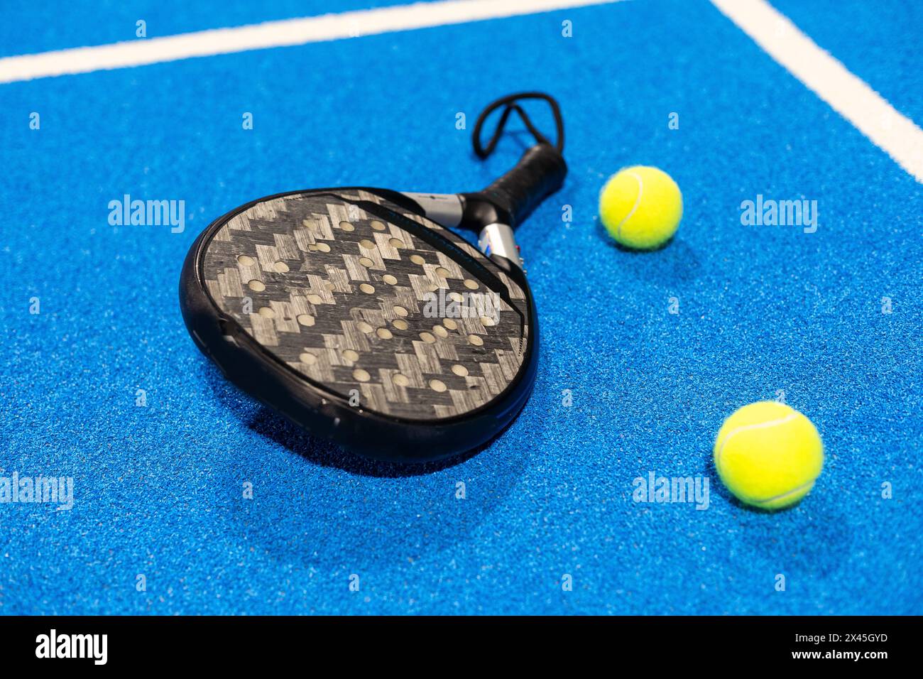 paddle tennis racket and balls on court Stock Photo - Alamy
