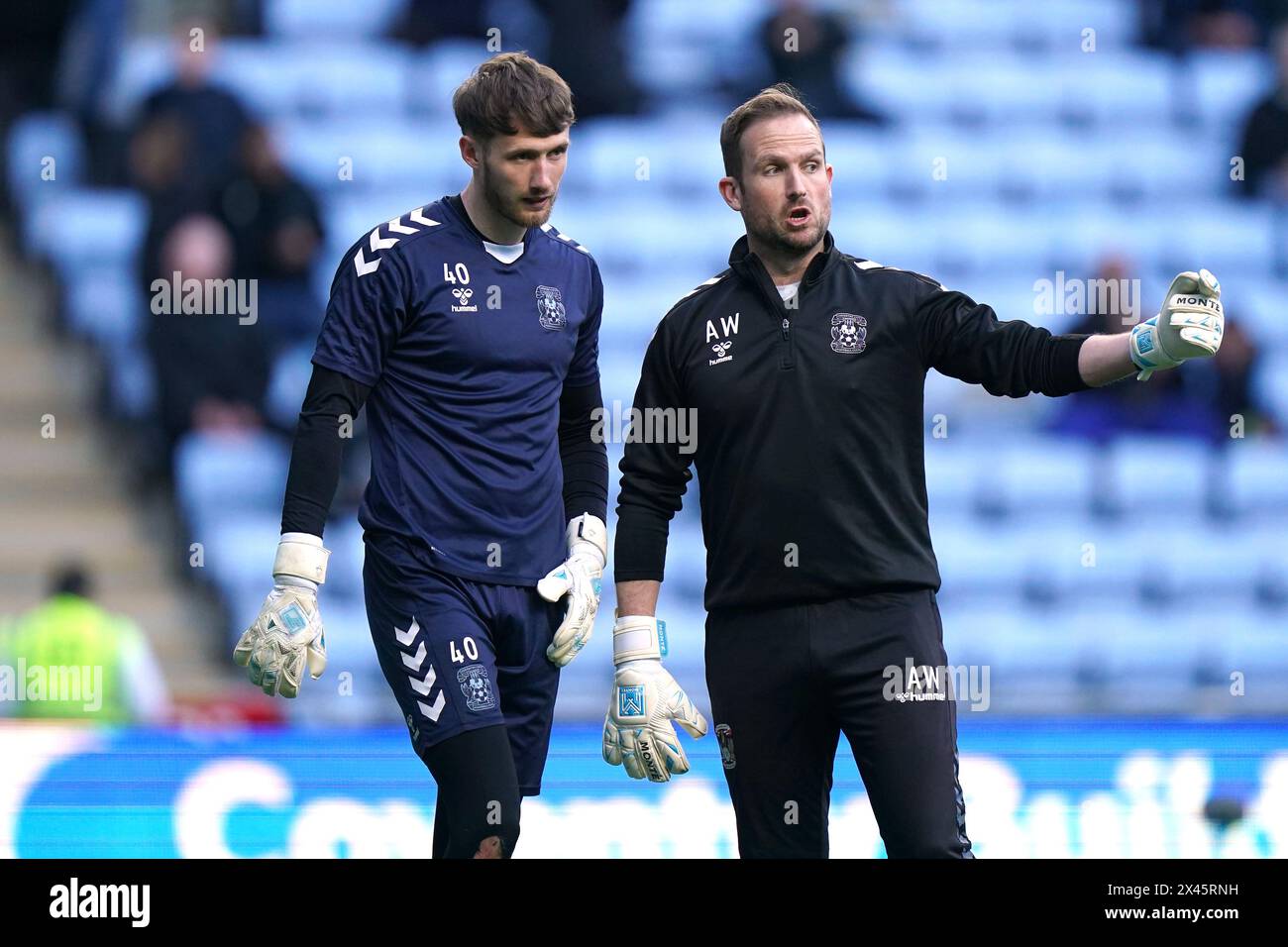 Coventry City goalkeeper Bradley Collins (left) and goalkeeping coach ...