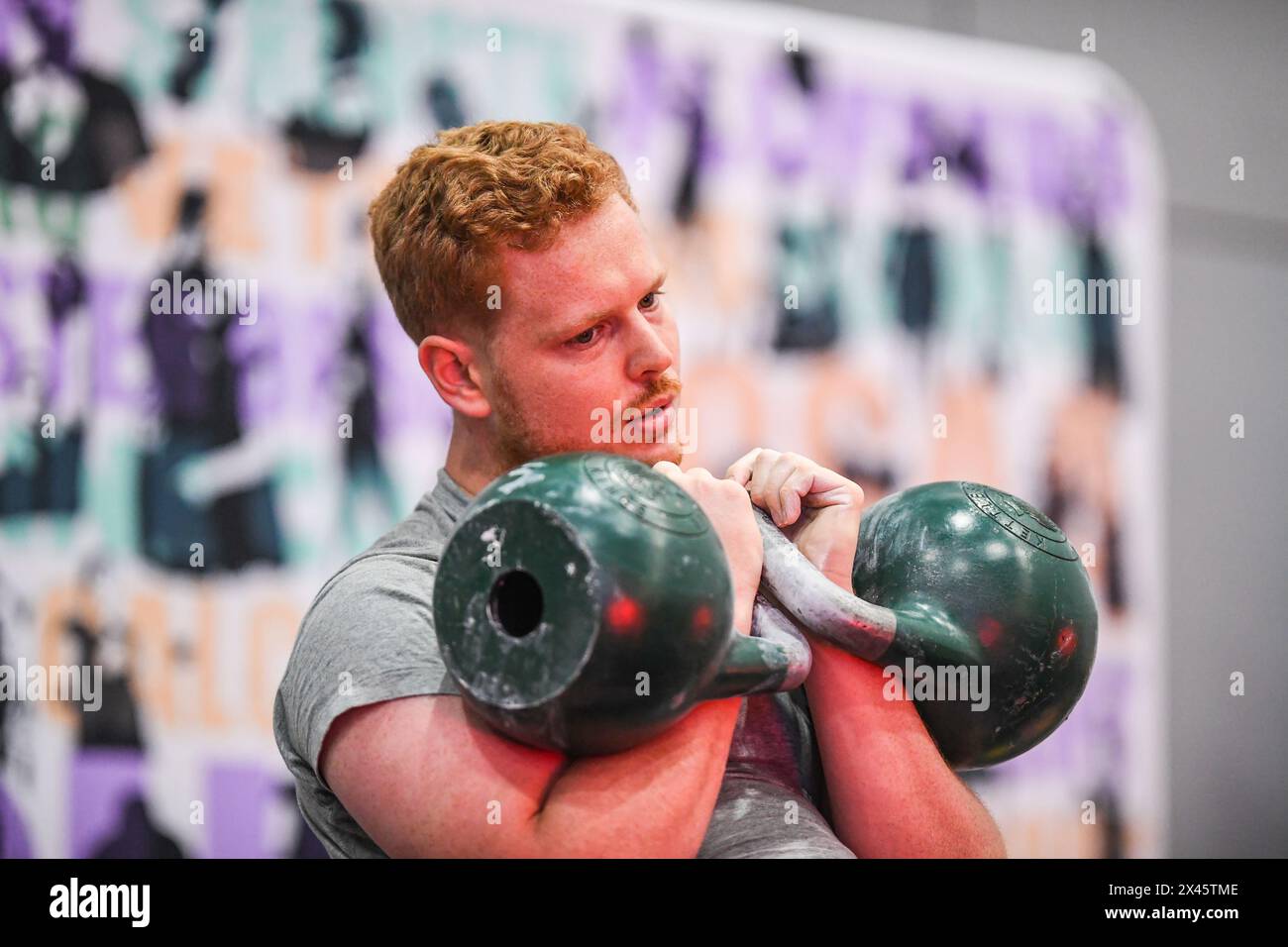 Australian Kettlebell competitor Joel McLean is seen in action during ...