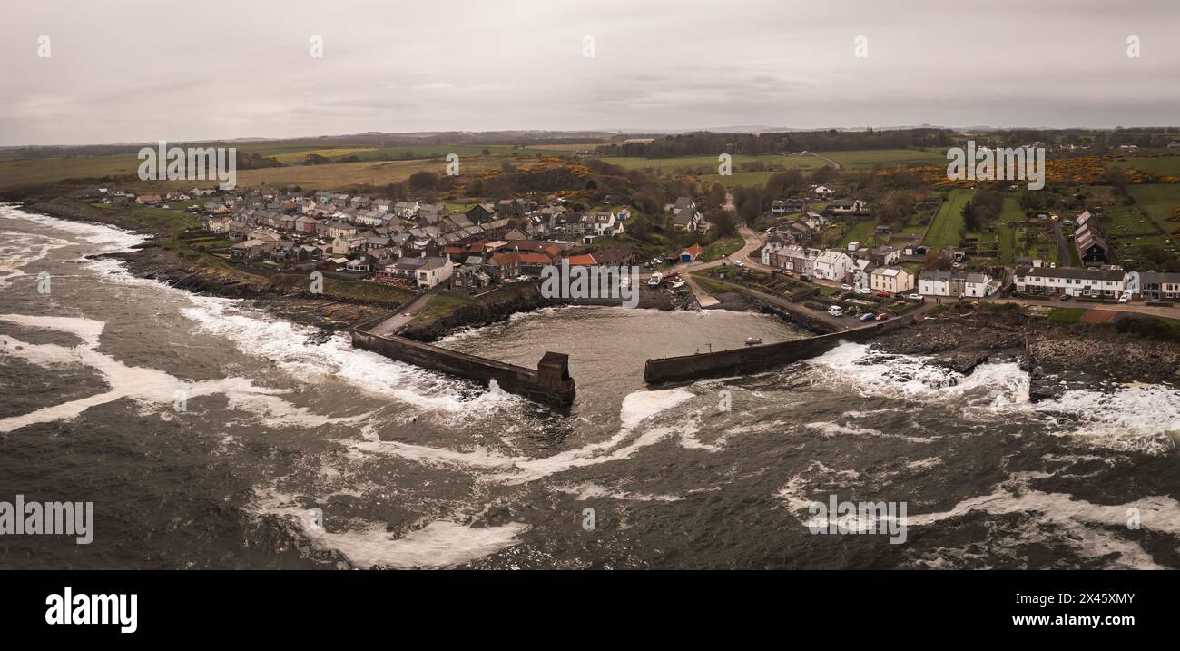 Aerial landscape panorama of the Northumberland fishing village of ...