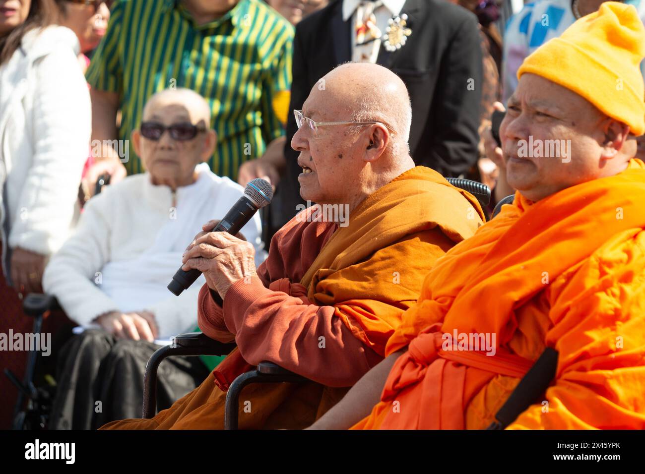 A senior Cambodian Buddhist monk speaks into a microphone during the ...