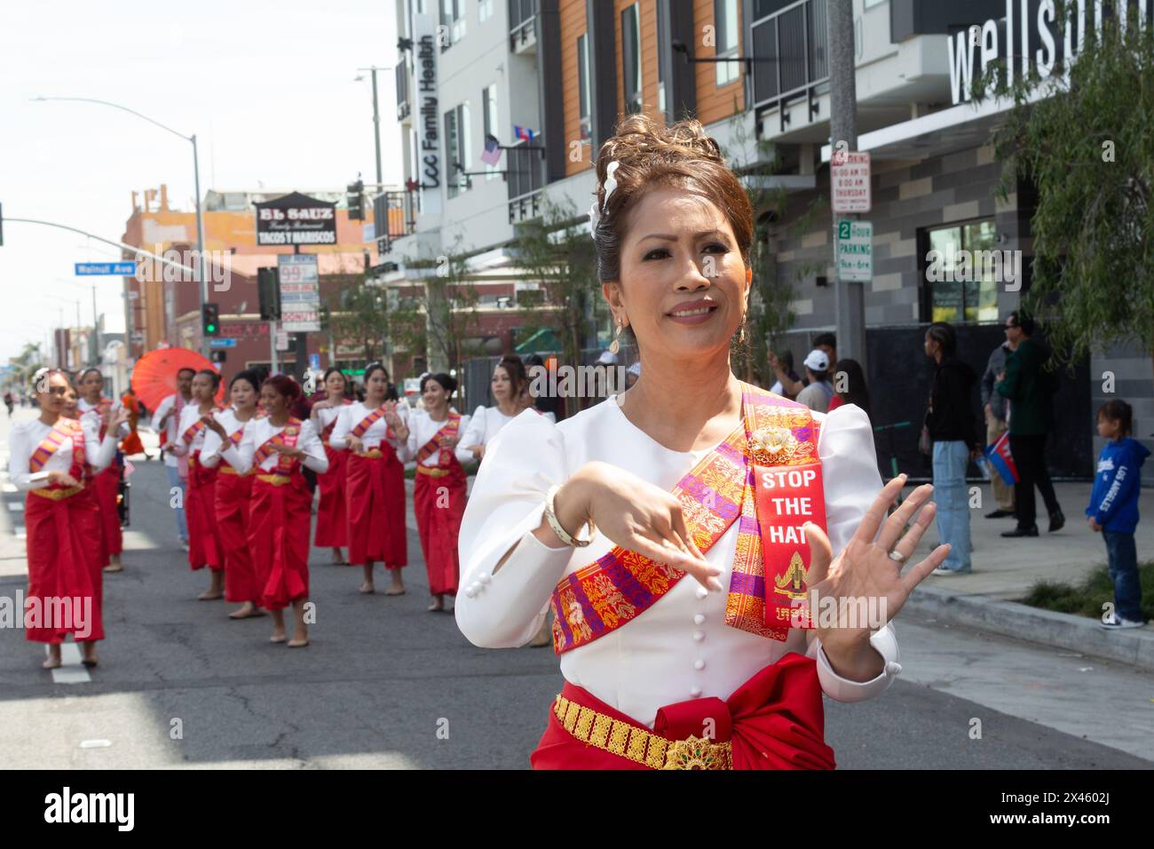 Adult Apsara dancers from the Stop the Hate Program walking in the ...